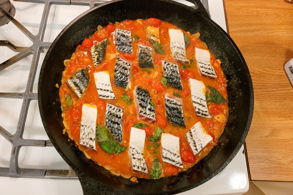 Braised Fish with Cherry Tomatoes, Garlic, and Basil - Ian Benites